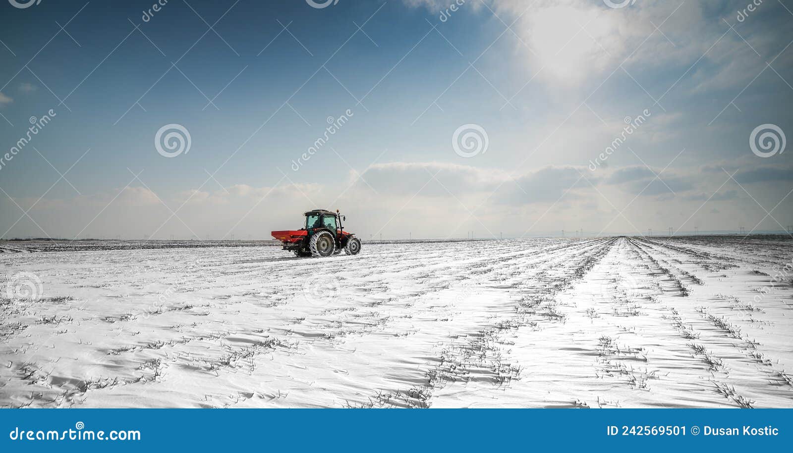 Farmer with Tractor Seeding - Sowing Crops at Agricultural Fields in ...