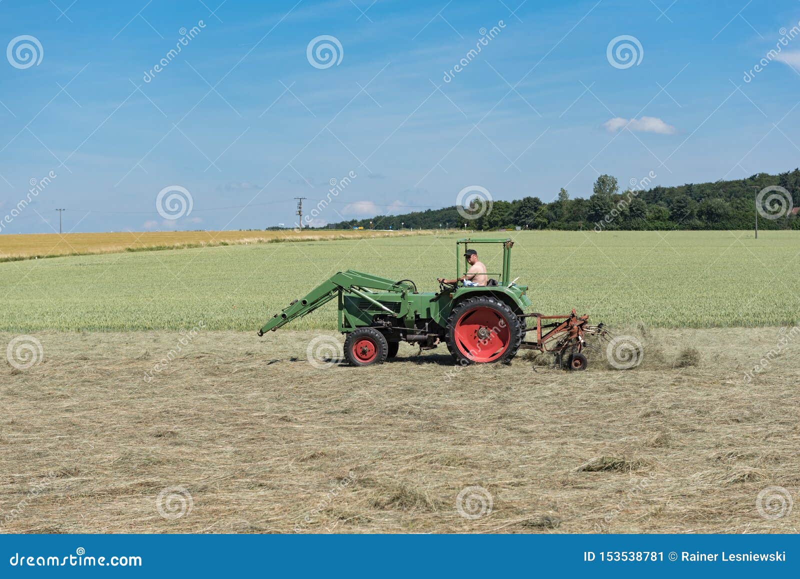 Old Farmer On Tractor In Cap At Ploughing Match Editorial Image ...