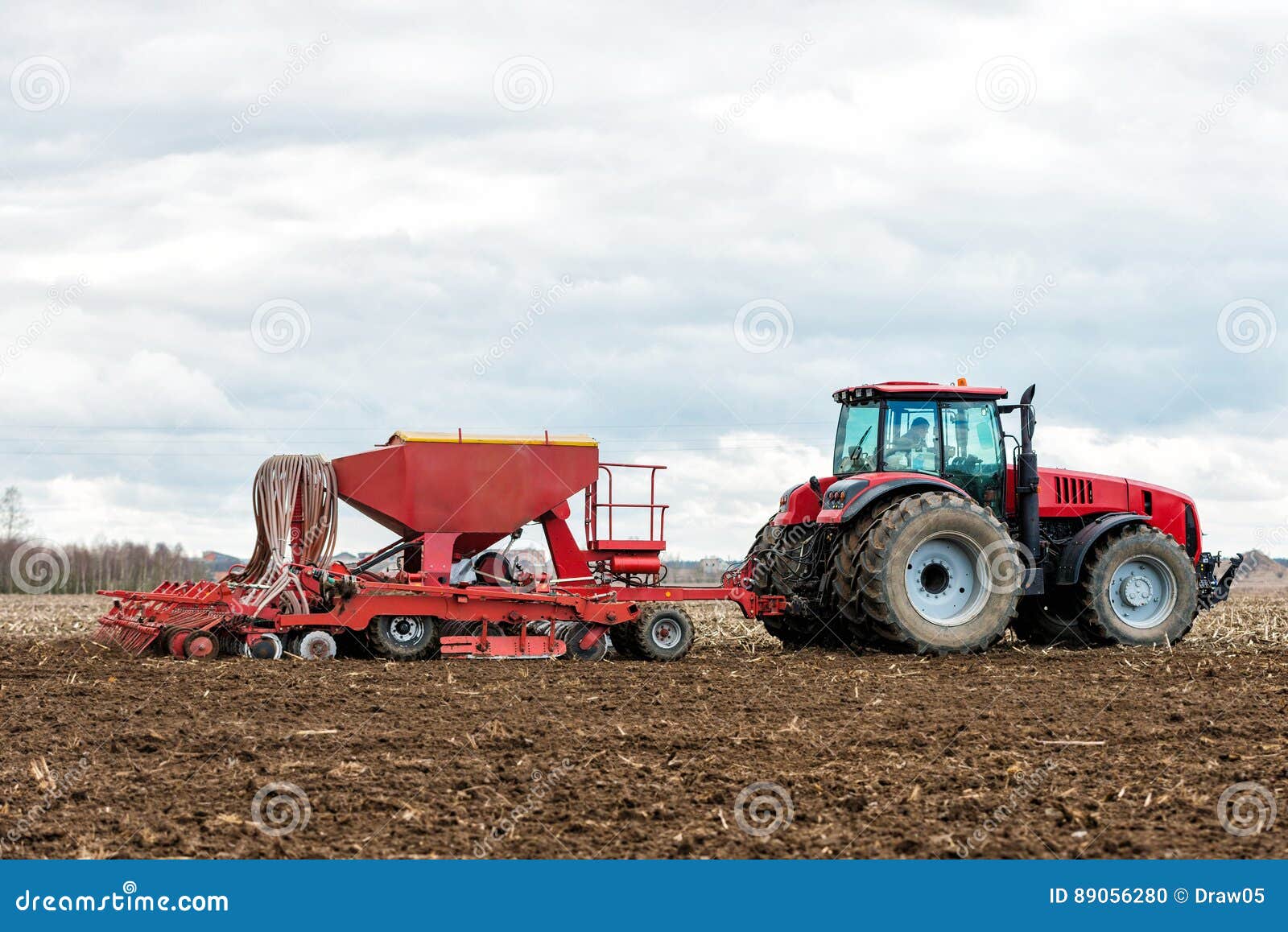 Farmer Tractor Working in the Field. Spring Time for Sowing Stock Photo ...