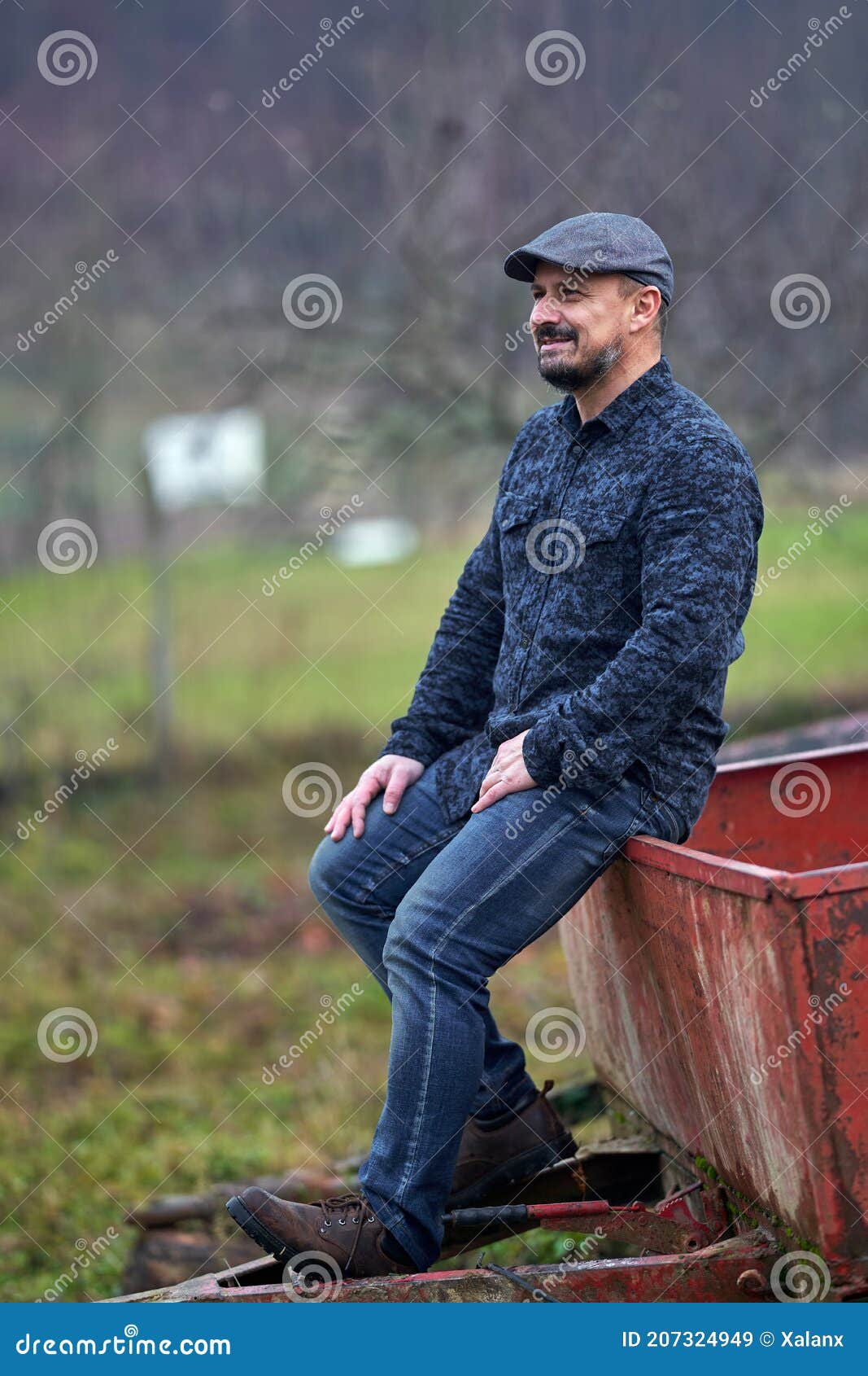 Farmer on a trailer stock image. Image of agriculture - 207324949
