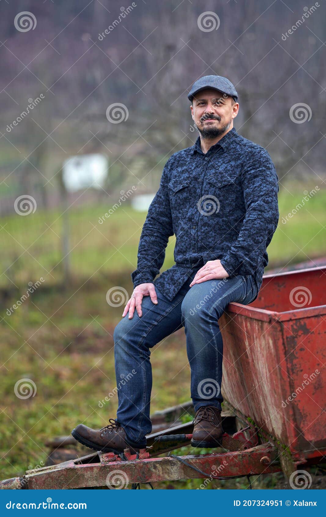 Farmer on a trailer stock image. Image of male, closeup - 207324951