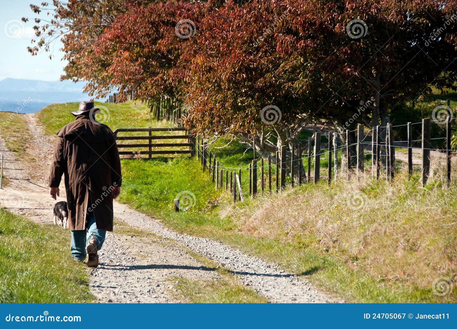 Farmer walking on his farm stock image. Image of autumn - 24705067