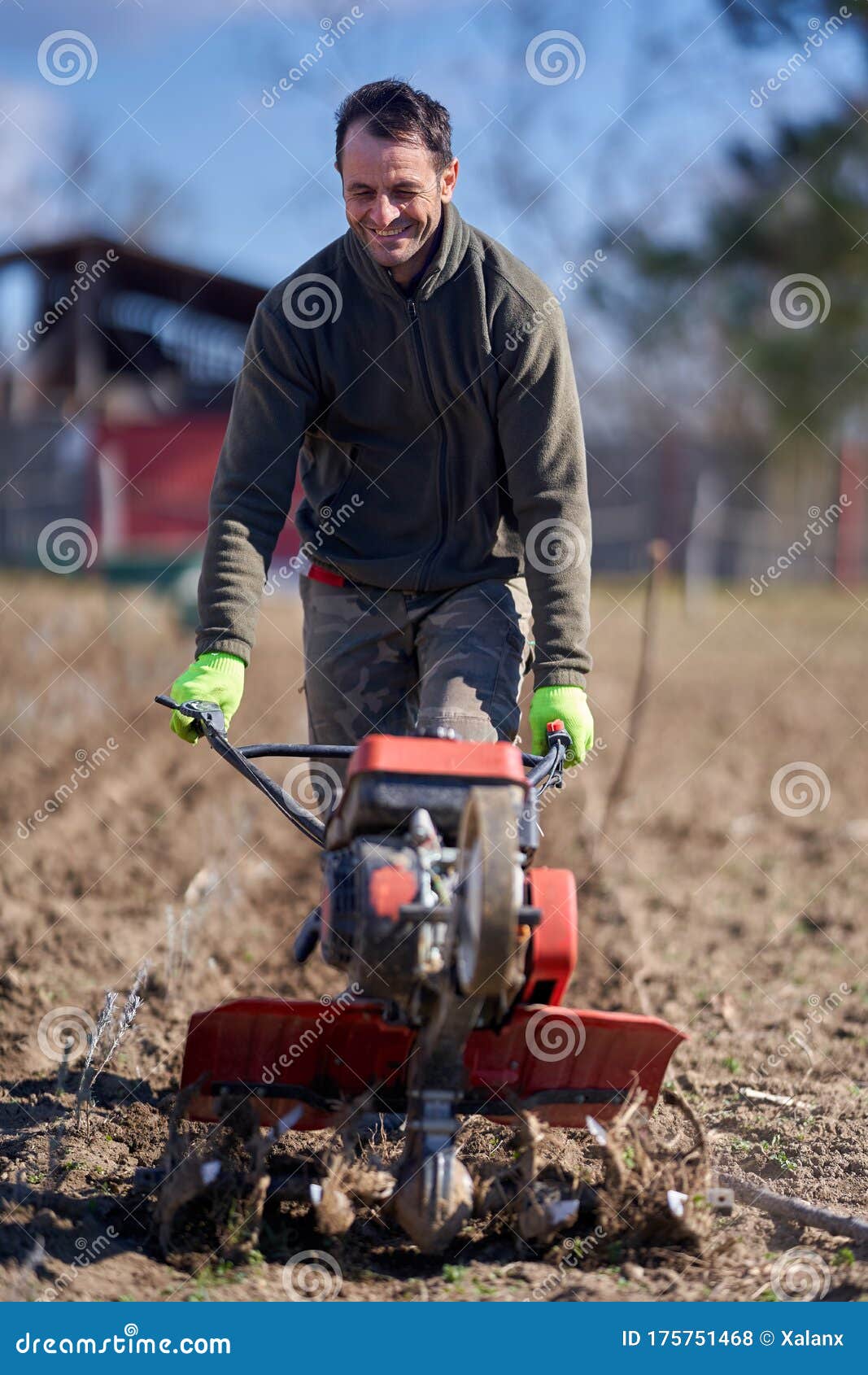 Farmer Weeding the Field with a Tiller Stock Photo - Image of herb ...