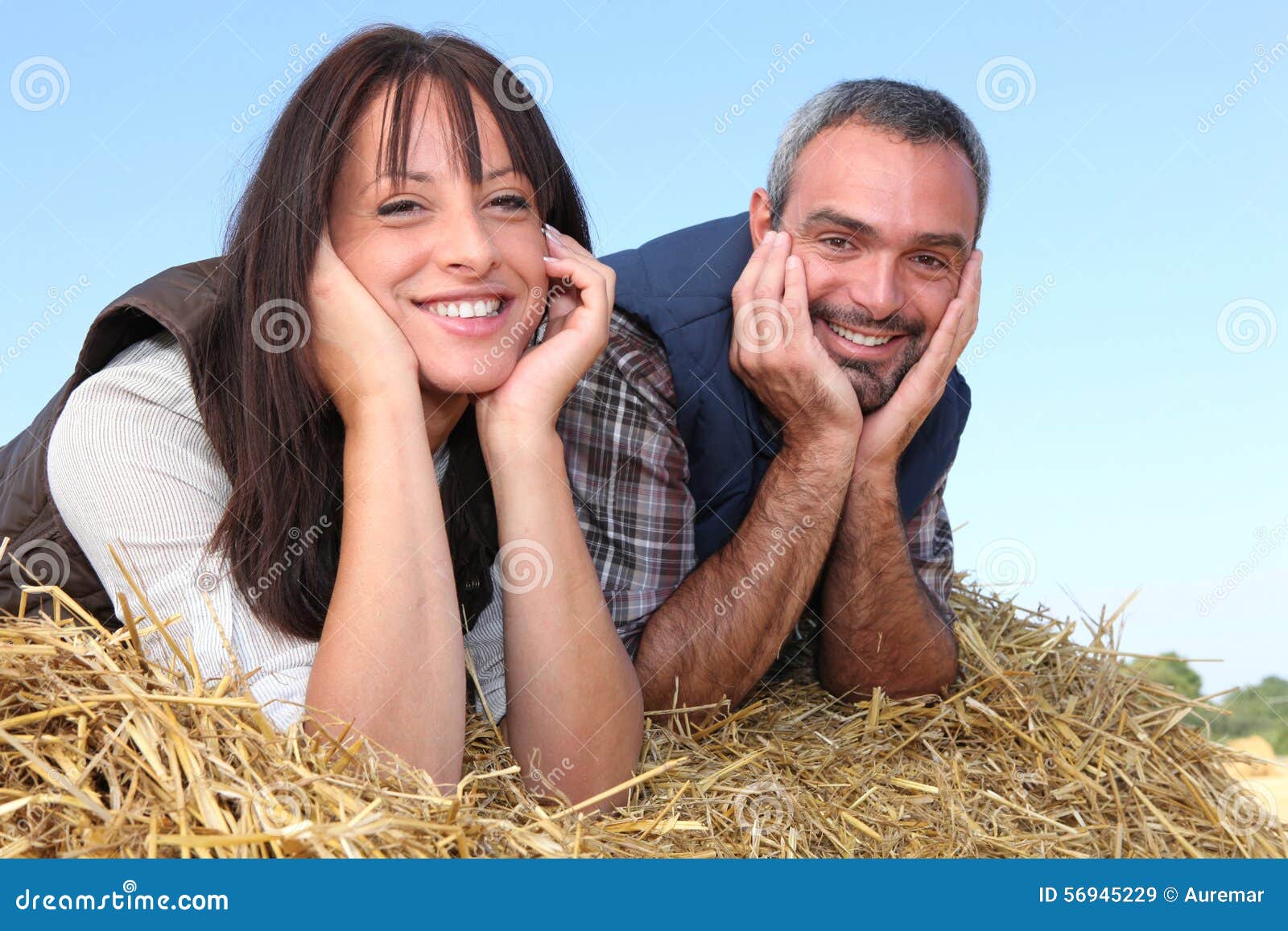 Farmer and Wife Laying in Hay Stock Image - Image of farmland, face ...