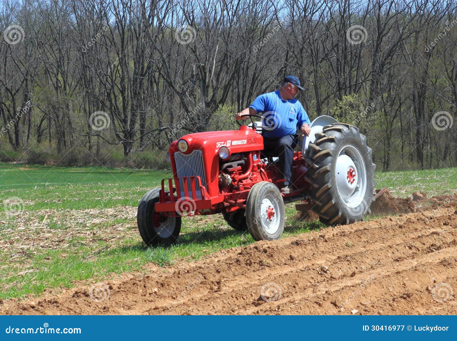 Farmer on Tractor editorial photography. Image of foods - 30416977