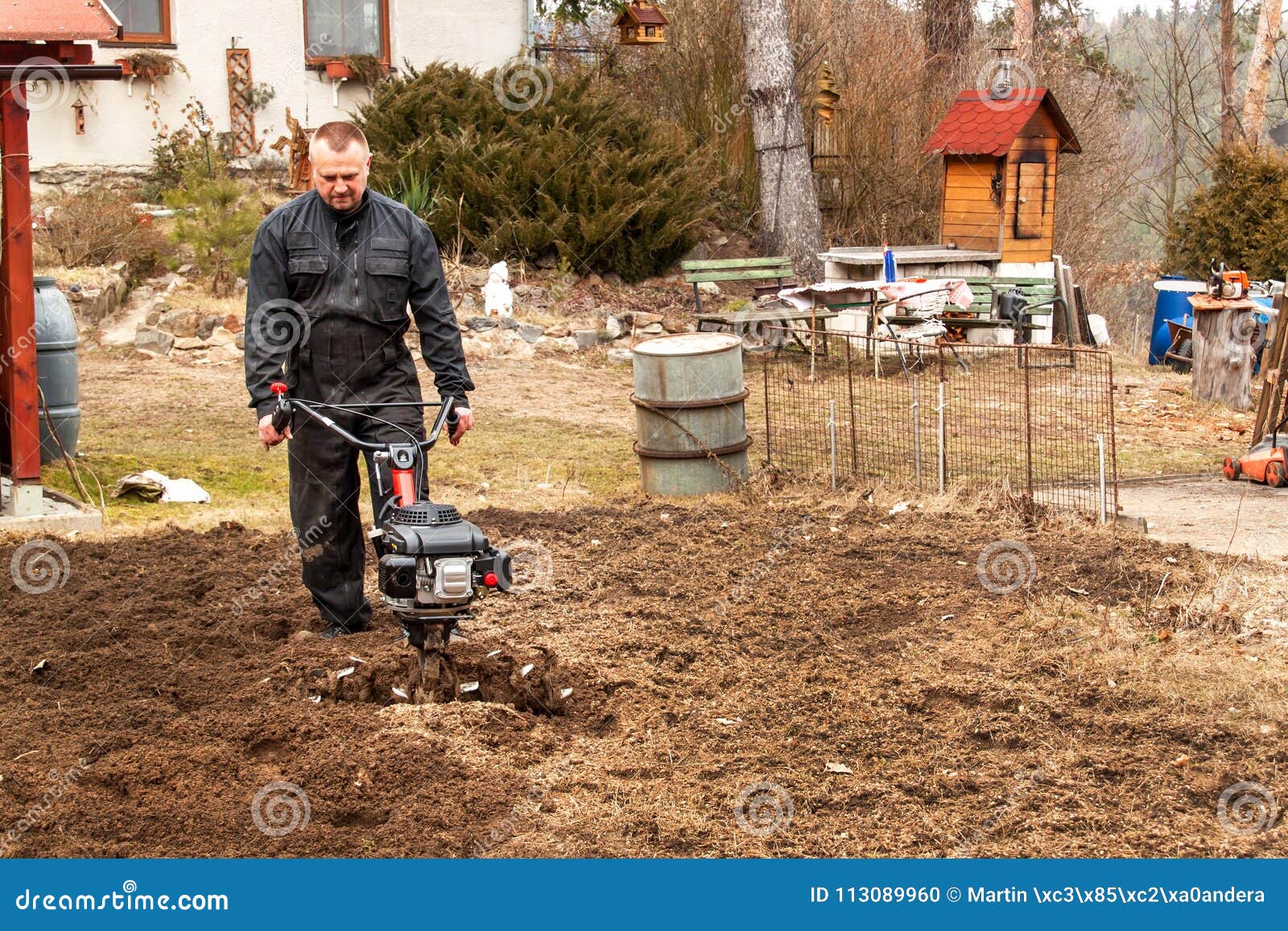 Farmer Working in the Field. Spring Work on the Farm. Man Plowing the ...