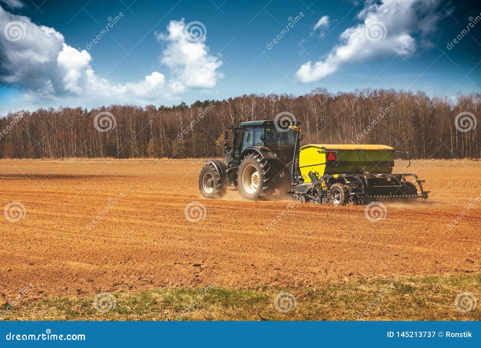 Farming - Farmer with Tractor on the Field Seeding Sowing Crops Stock ...