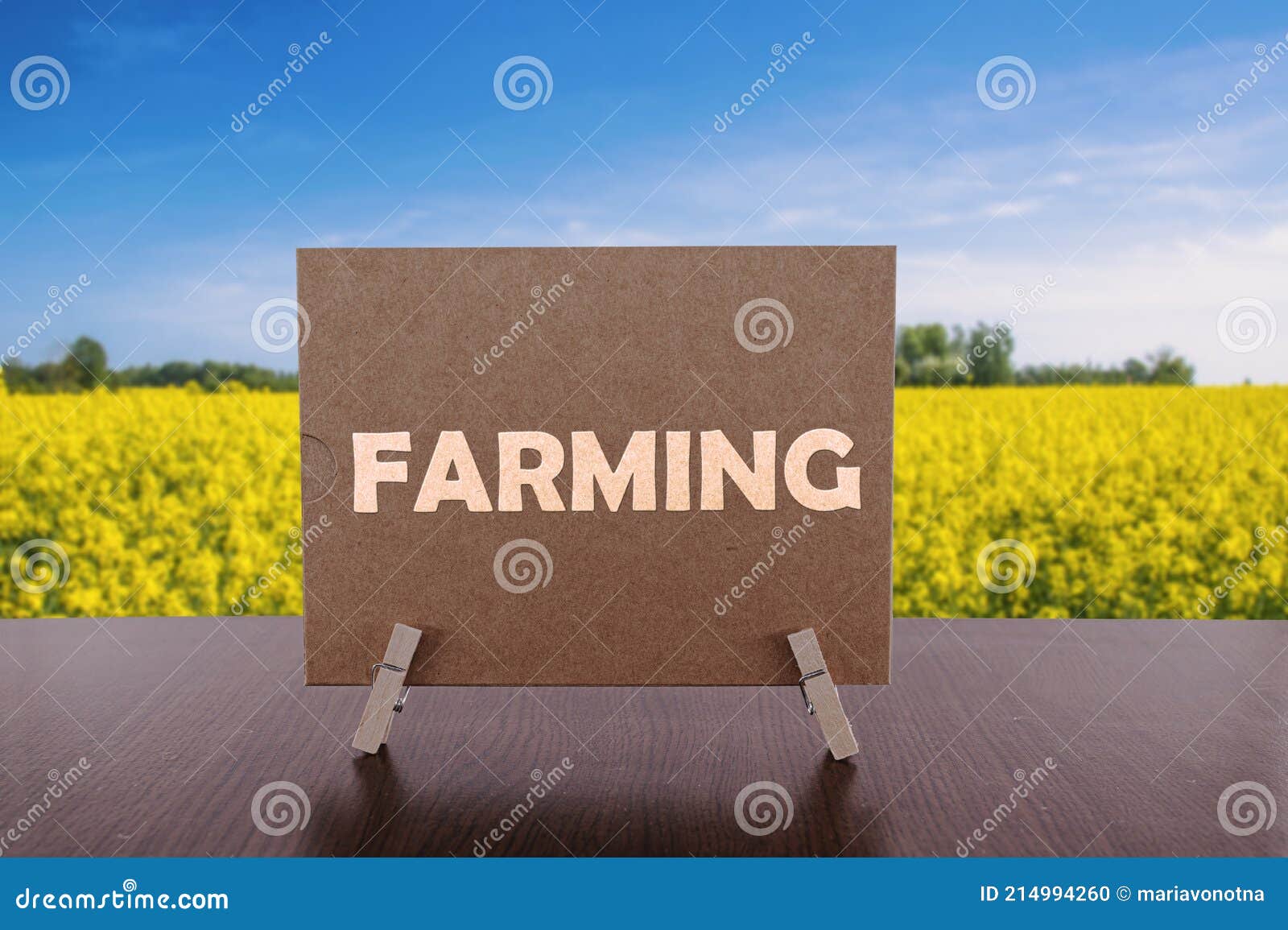 Farming Text on Card on the Table with Yellow Field and Blue Sky ...