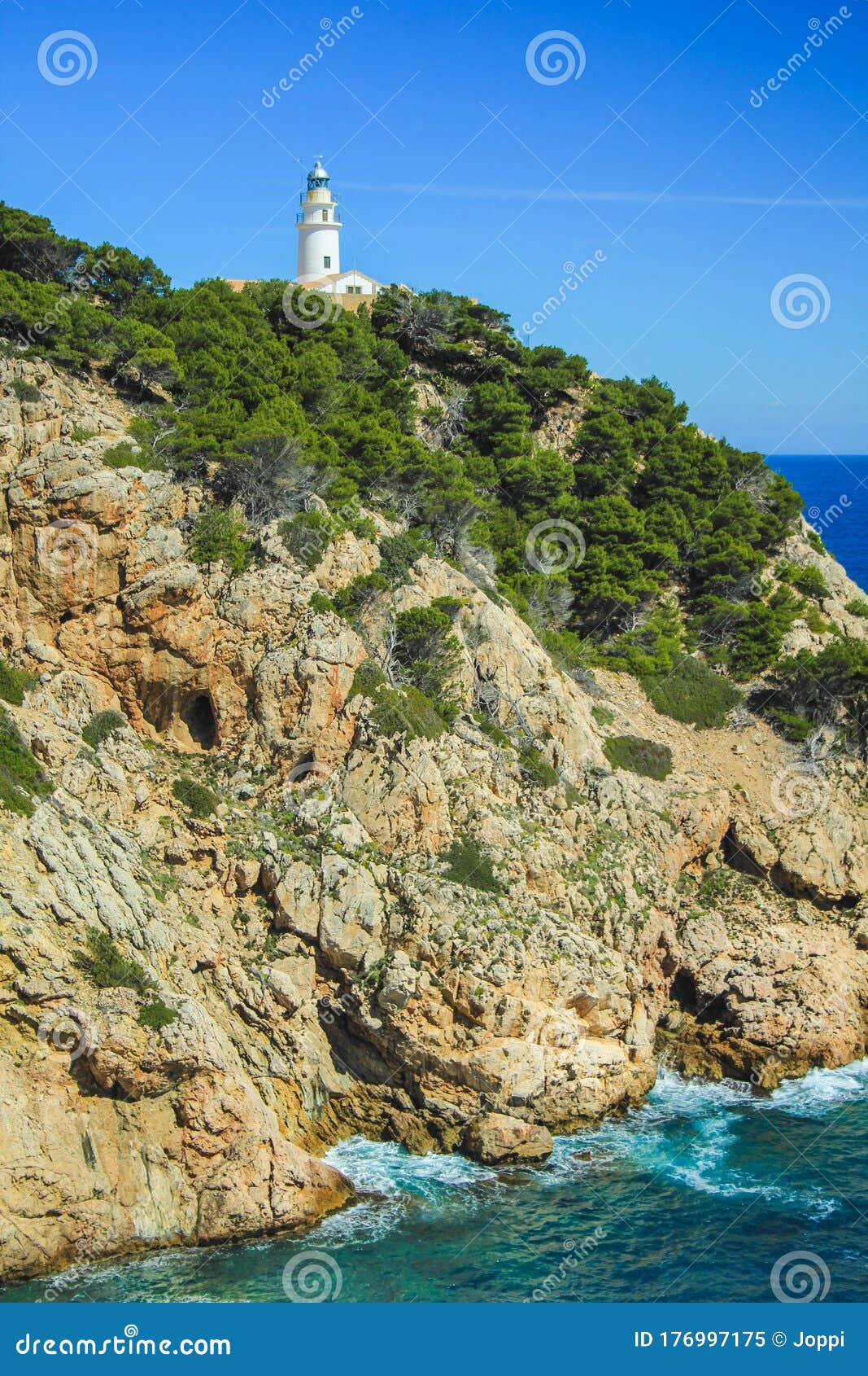Faro De Capdepera Lighthouse on Top of Cliffs in Cala Gat Near Cala ...