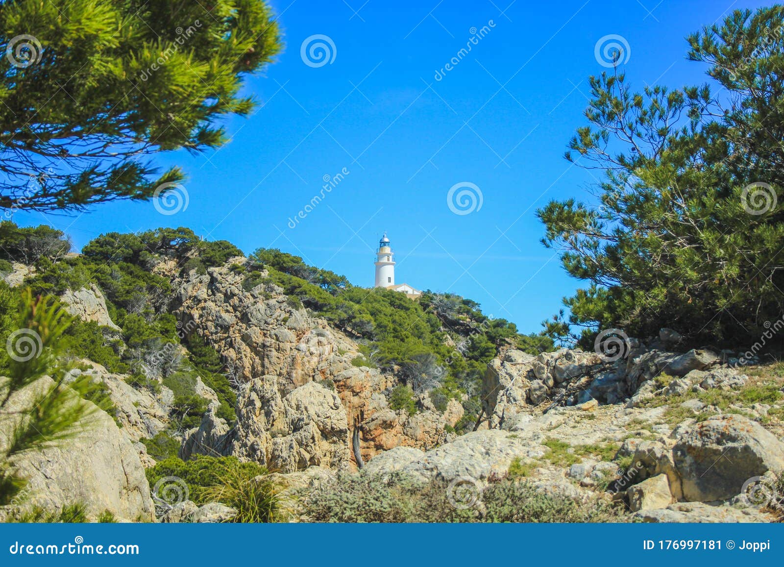 Faro De Capdepera Lighthouse on Top of Cliffs in Cala Gat Near Cala ...