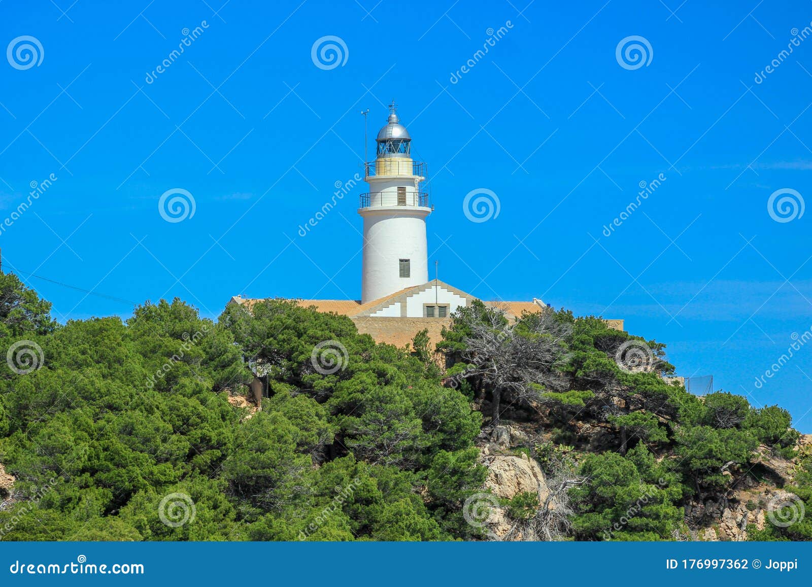 Faro De Capdepera Lighthouse on Top of Cliffs in Cala Gat Near Cala ...