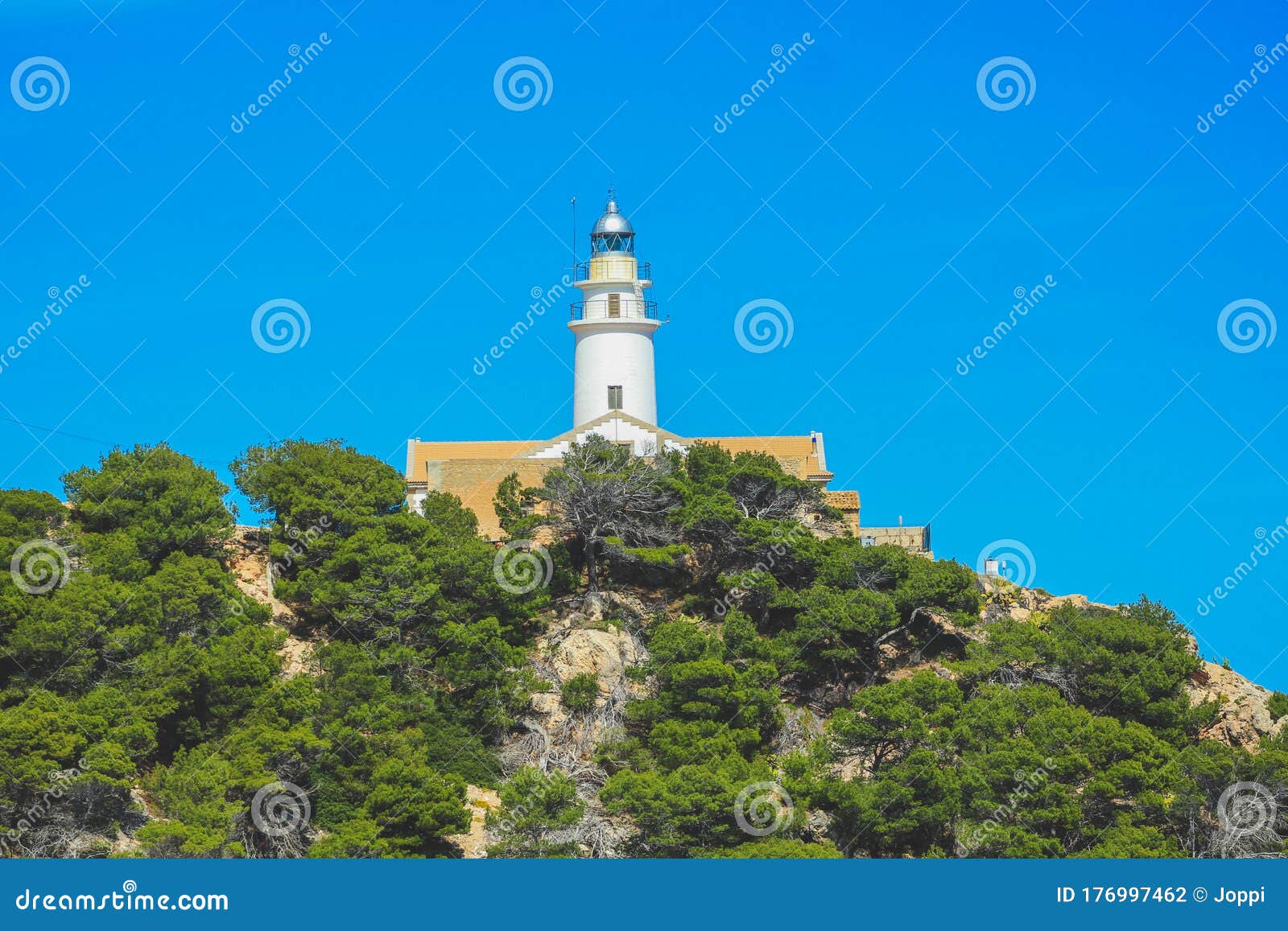 Faro De Capdepera Lighthouse on Top of Cliffs in Cala Gat Near Cala ...