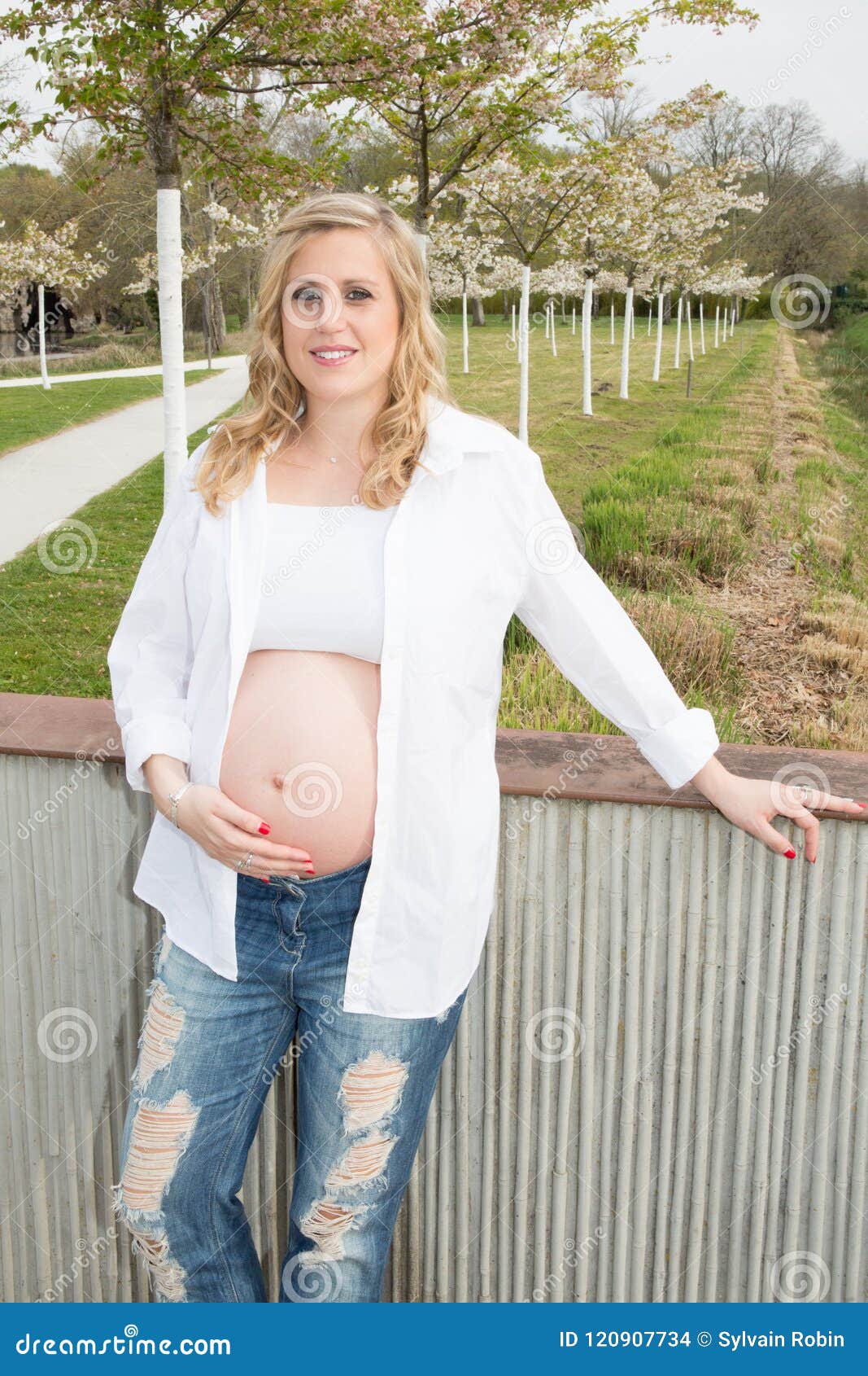 Blonde Woman Outdoor In Pregnancy A Pregnant Concept With Beauty Girl