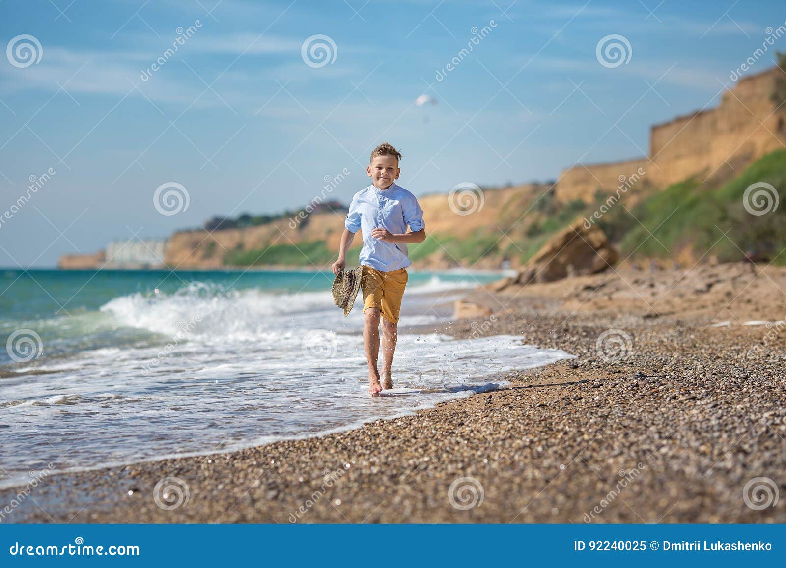 Fashion boy on the beach stock image. Image of outside - 92240025