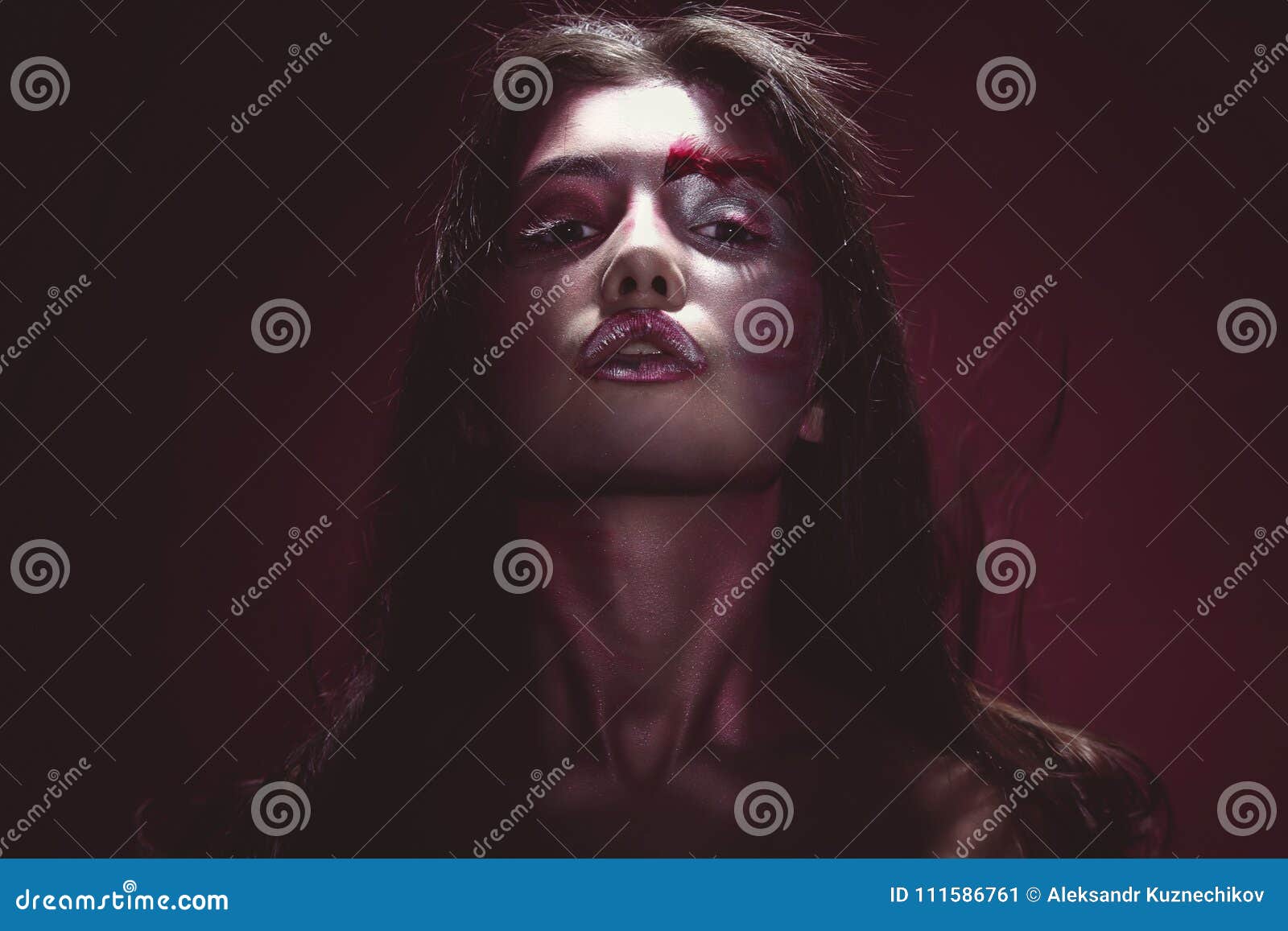 Fashion Portrait Of A Dark Skinned Girl With Silver Foil Make Up