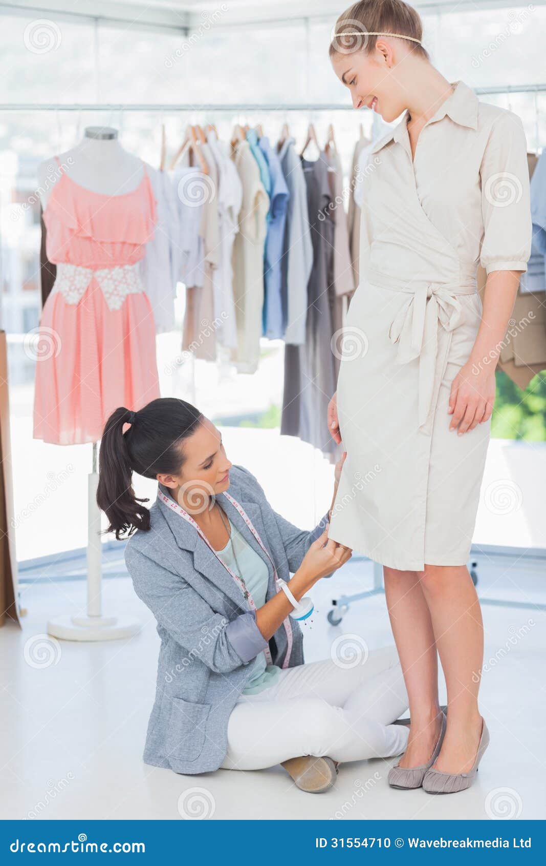 Fashion Designer Adjusting Dress Stock Photo - Image of happy, cool ...