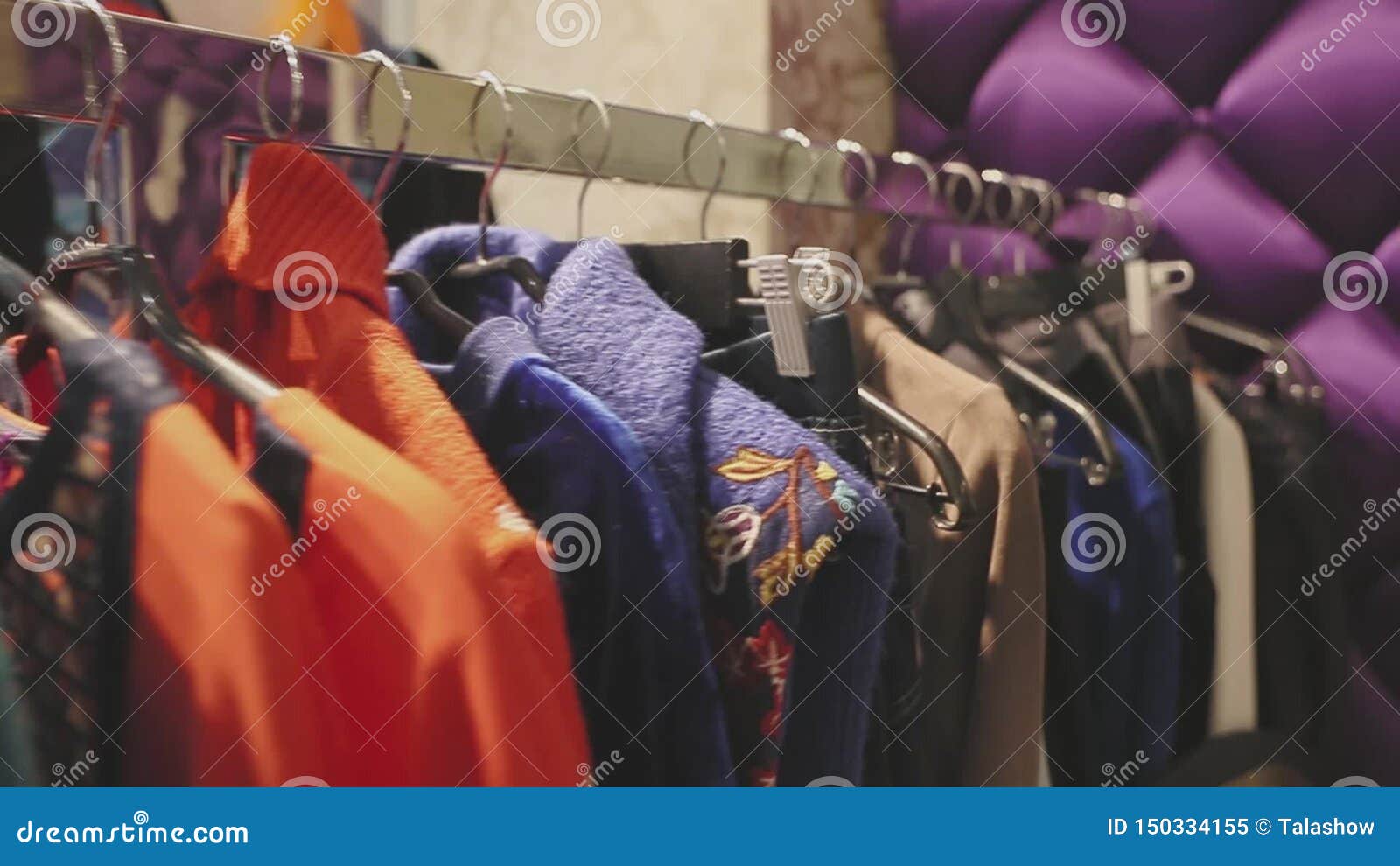 Fashion Designer Clothes on Hangers in the Store Stock Video - Video of ...