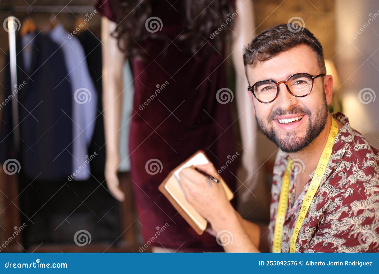 Fashion Designer Taking Notes on Traditional Note Pad Stock Photo ...