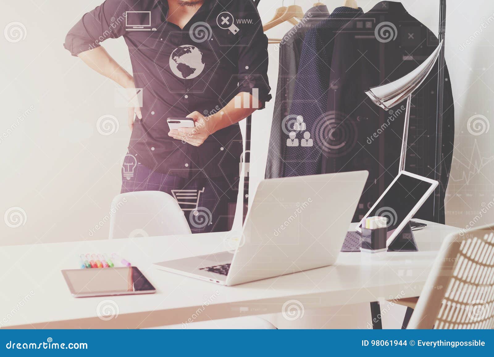 Fashion Designer Using Mobile Phone and Using Laptop with Digital ...