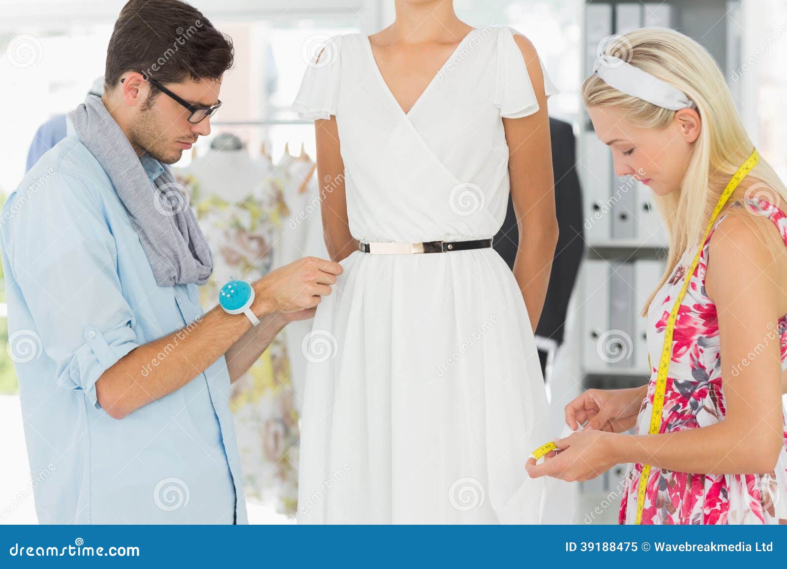 Fashion Designers Adjusting Dress on Model Stock Image - Image of ...