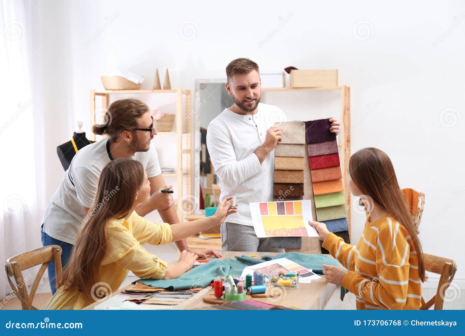 Fashion Designers Creating Clothes in Studio Stock Photo - Image of ...