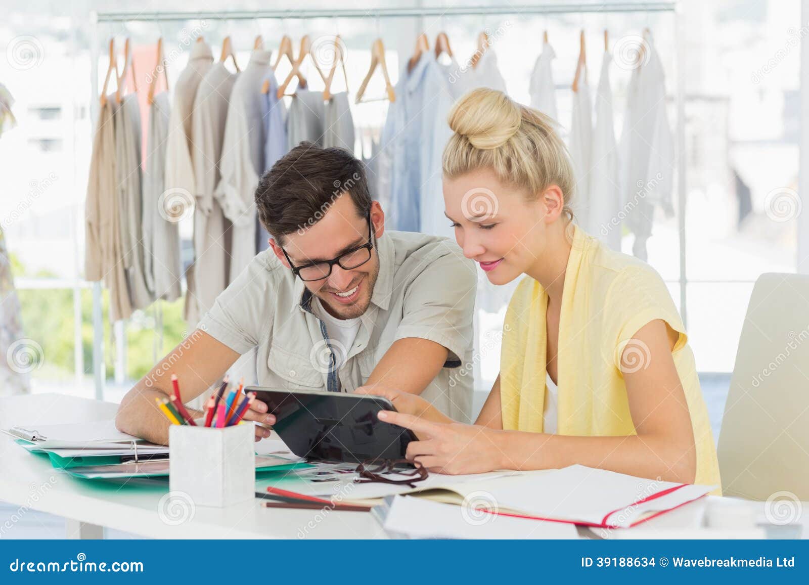 Fashion Designers Using Digital Laptop Stock Photo - Image of male ...