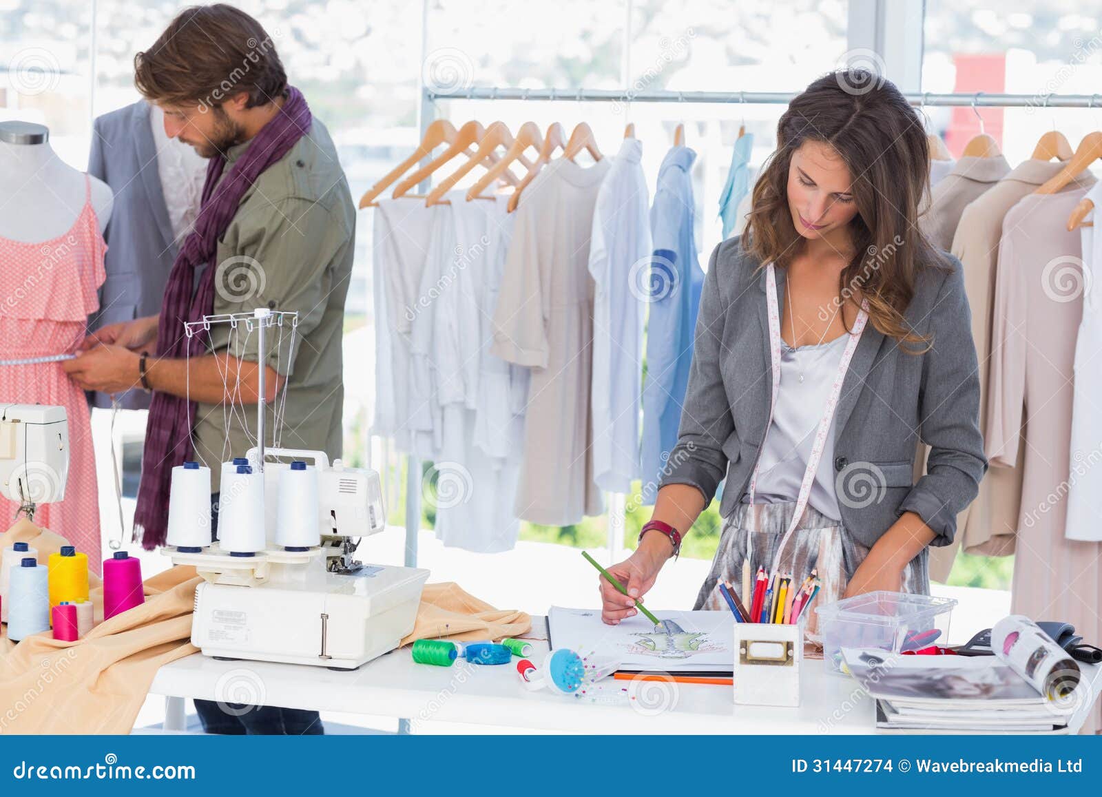 Fashion designers working stock photo. Image of attractive - 31447274