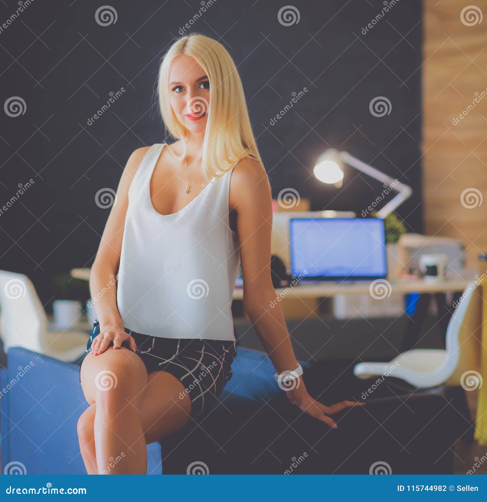 Fashion Designers Working in Studio Sitting on the Desk Stock Photo ...