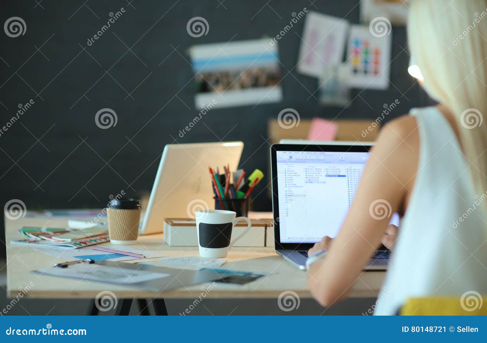 Fashion Designers Working in Studio Sitting on the Desk Stock Image ...