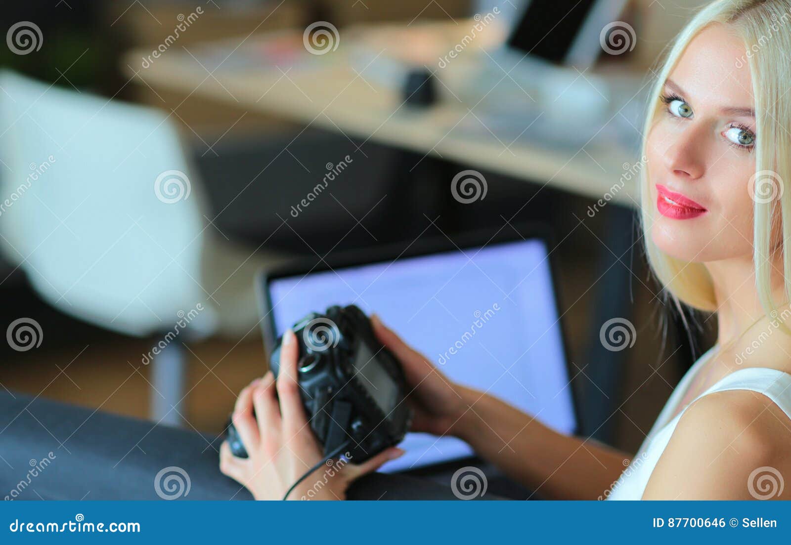 Fashion Designers Working in Studio Sitting on the Desk Stock Photo ...