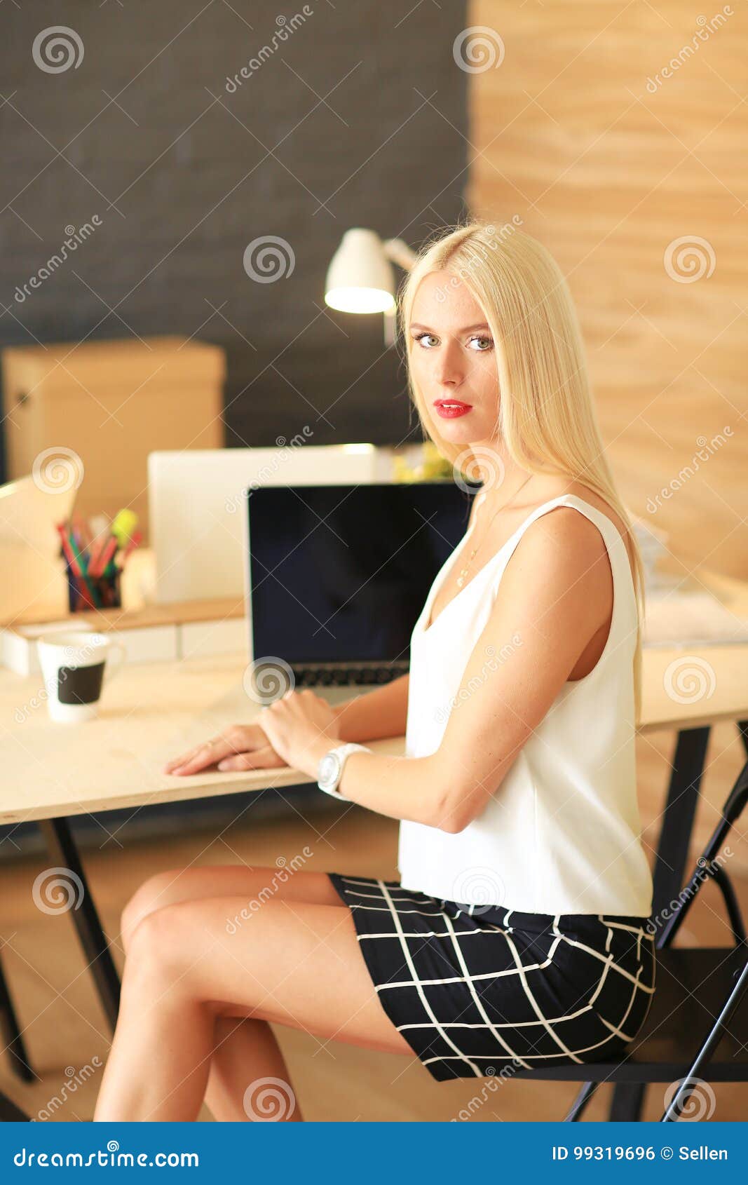 Fashion Designers Working in Studio Sitting on the Desk. Stock Photo ...