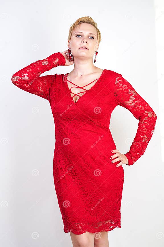 Fashion Female In Red Lace Dress Standing Alone Plus Size Blonde Woman