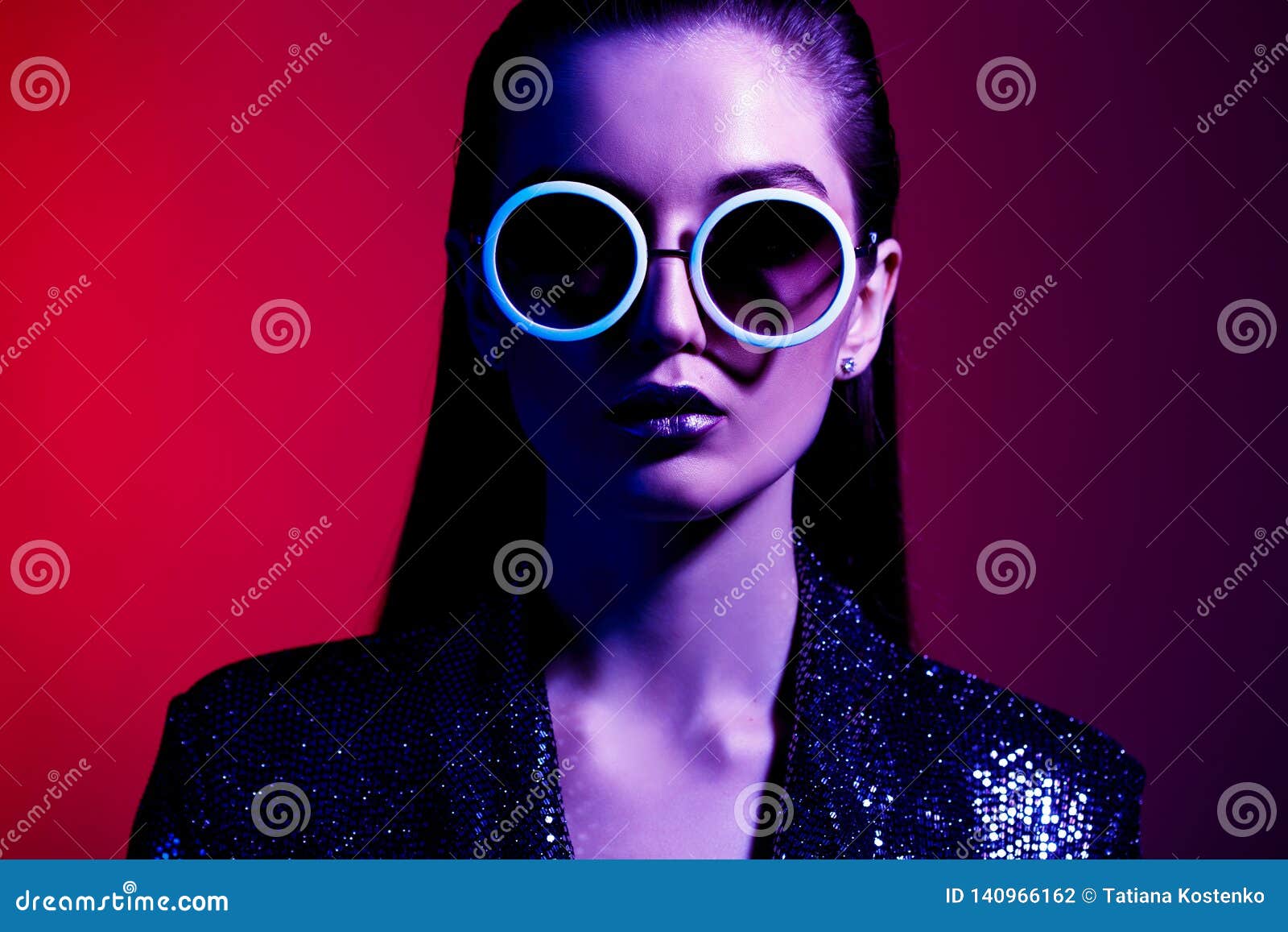 Fashion Girl With Long Hair And Round Sunglasses In A Black Shining