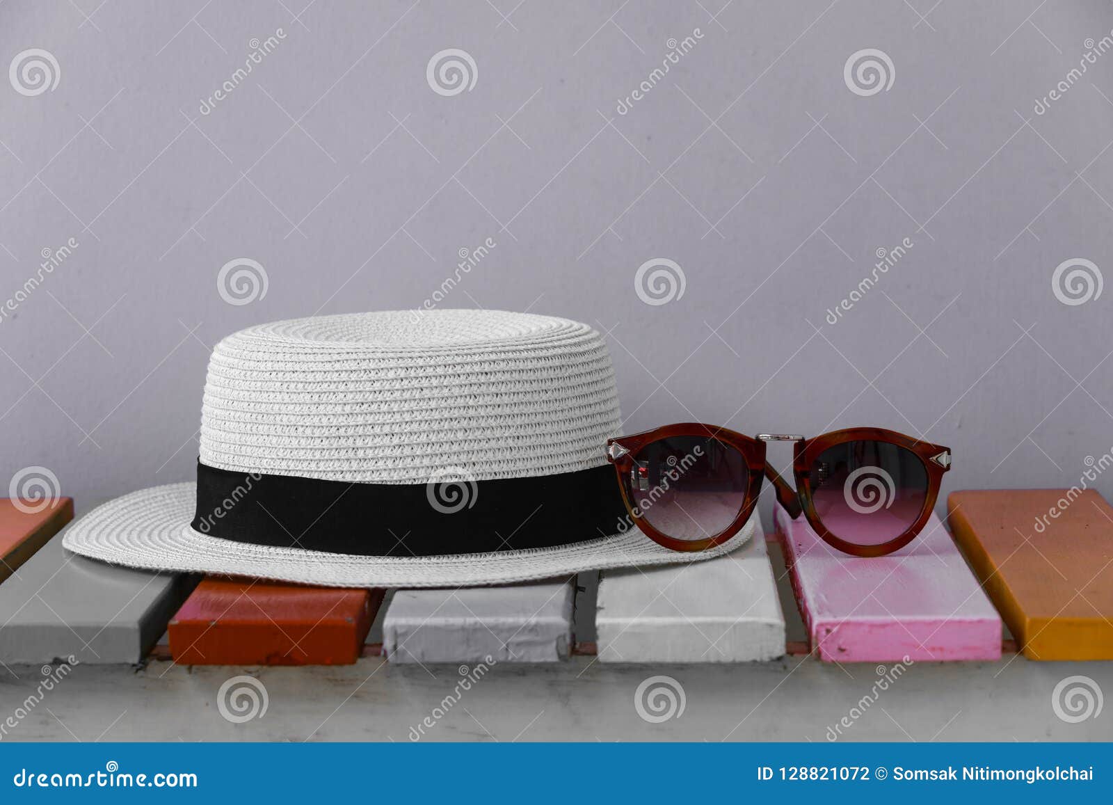 Fashion hat on the table stock photo. Image of decoration - 128821072