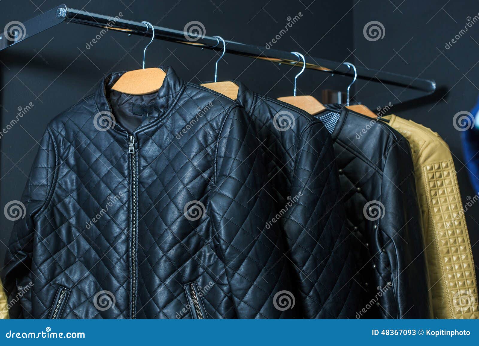 Fashion jacket on hangers stock image. Image of hanging - 48367093