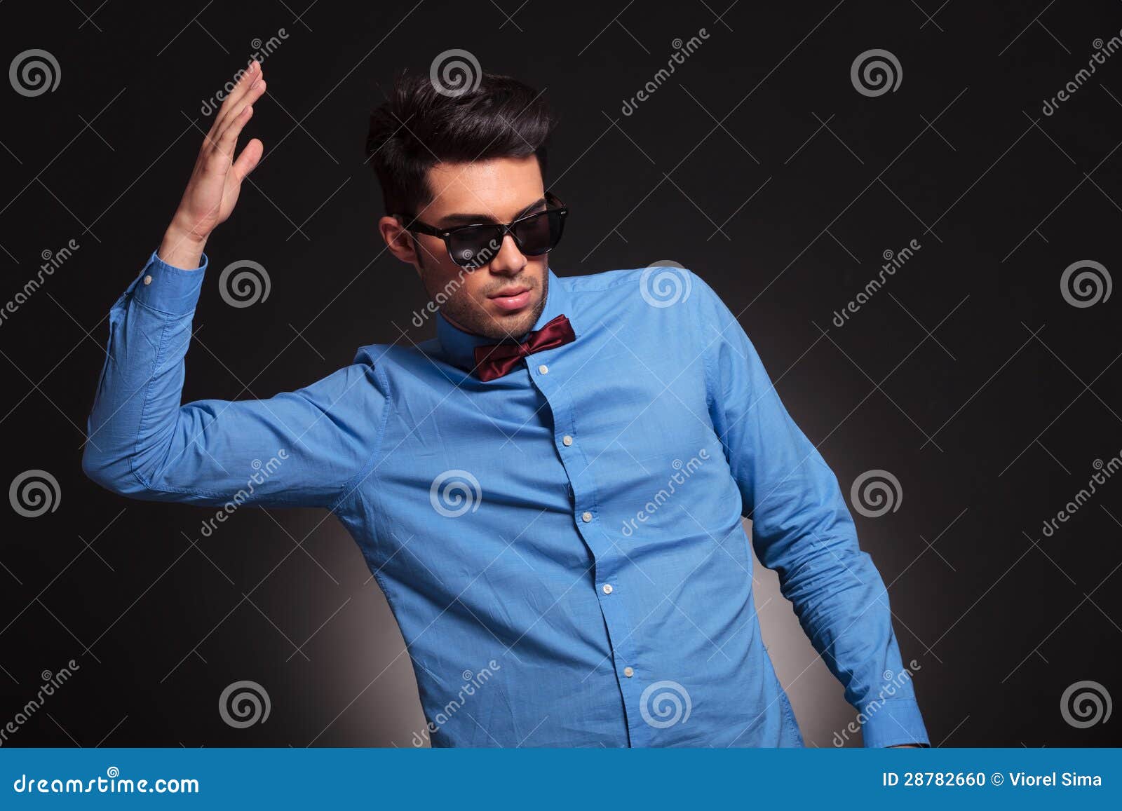 Fashion Man with Hand Inthe Air Stock Photo - Image of open, facing ...