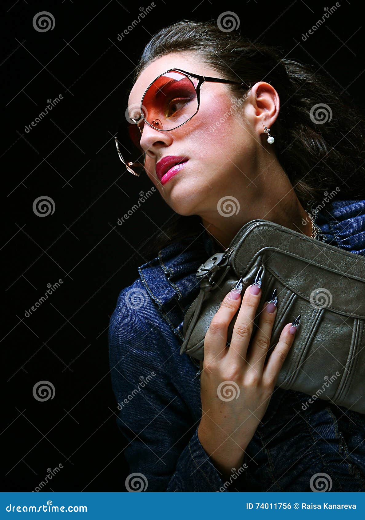 Fashion model with a bag stock photo. Image of clothing - 74011756