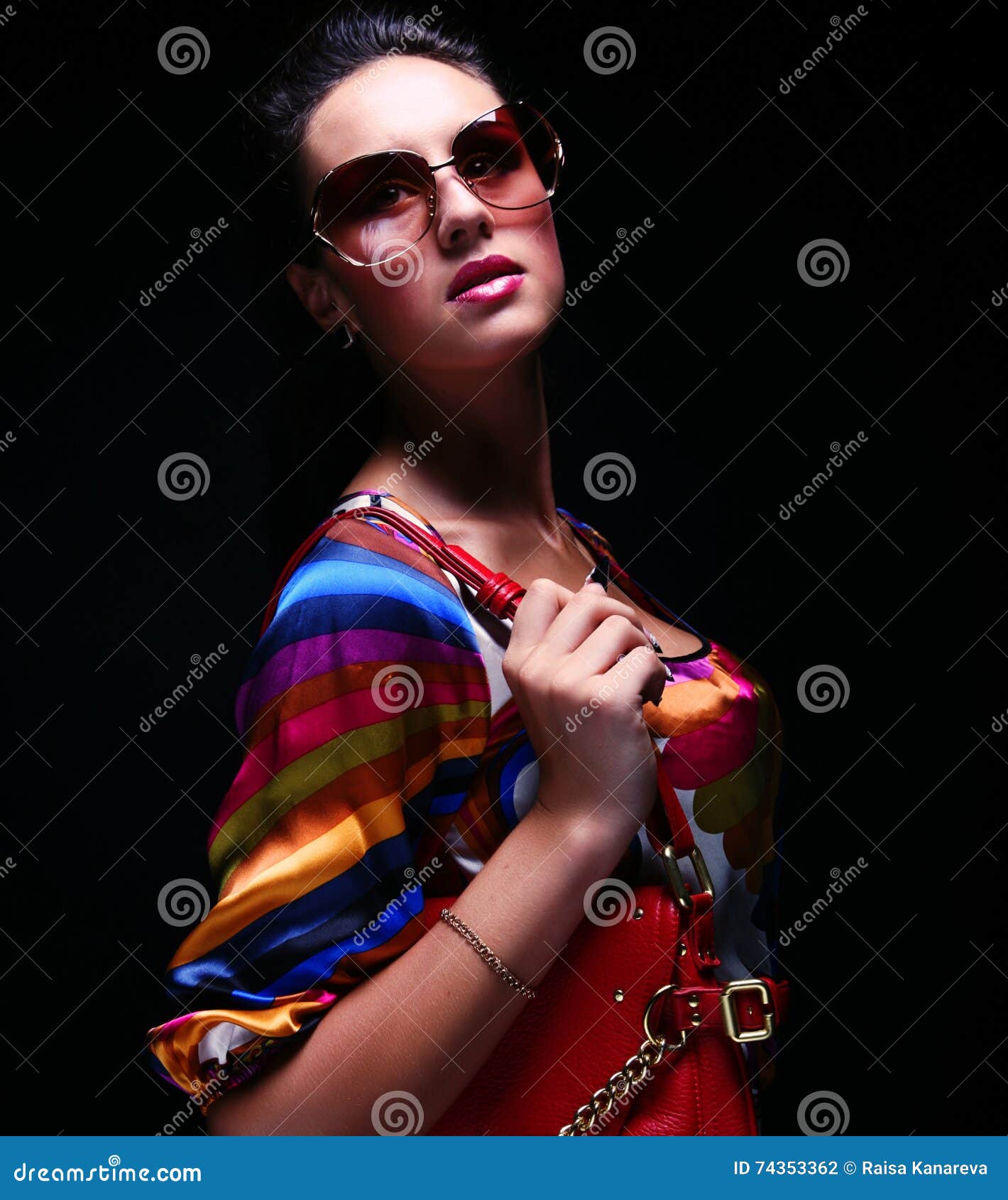 Fashion model with a bag stock photo. Image of studio - 74353362