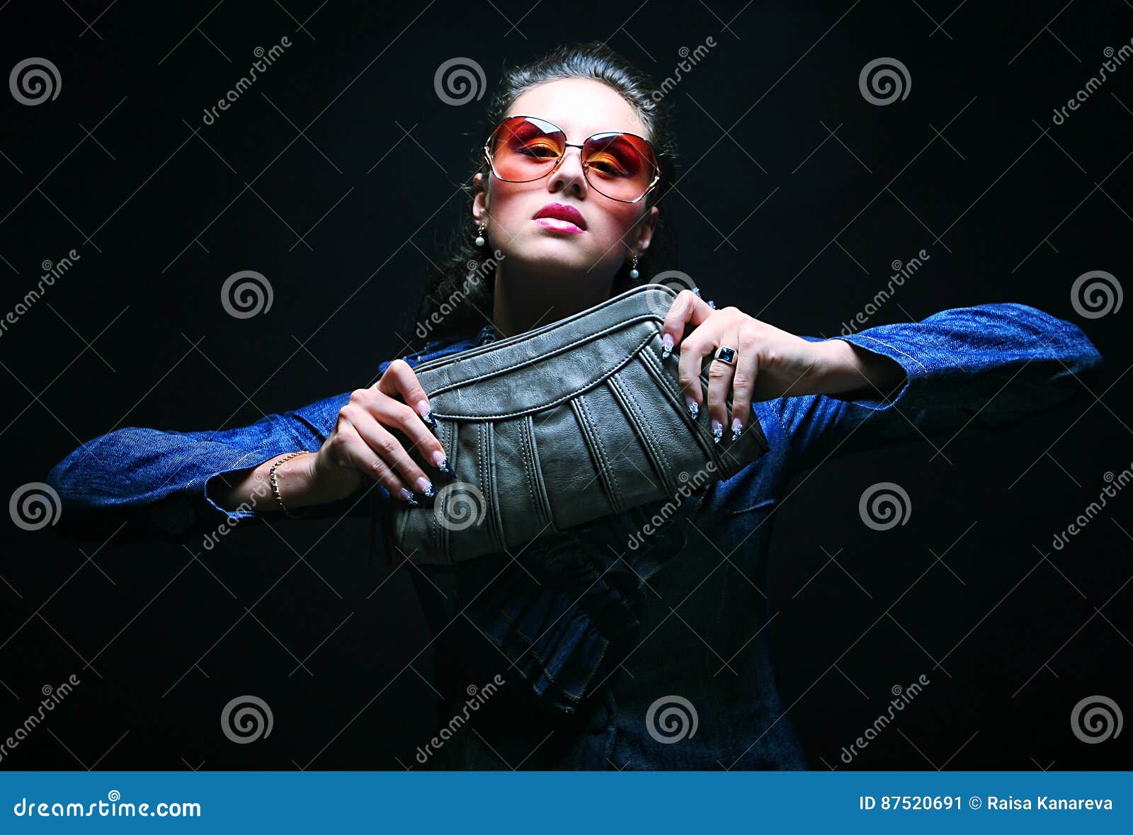 Fashion model with a bag stock image. Image of camera - 87520691