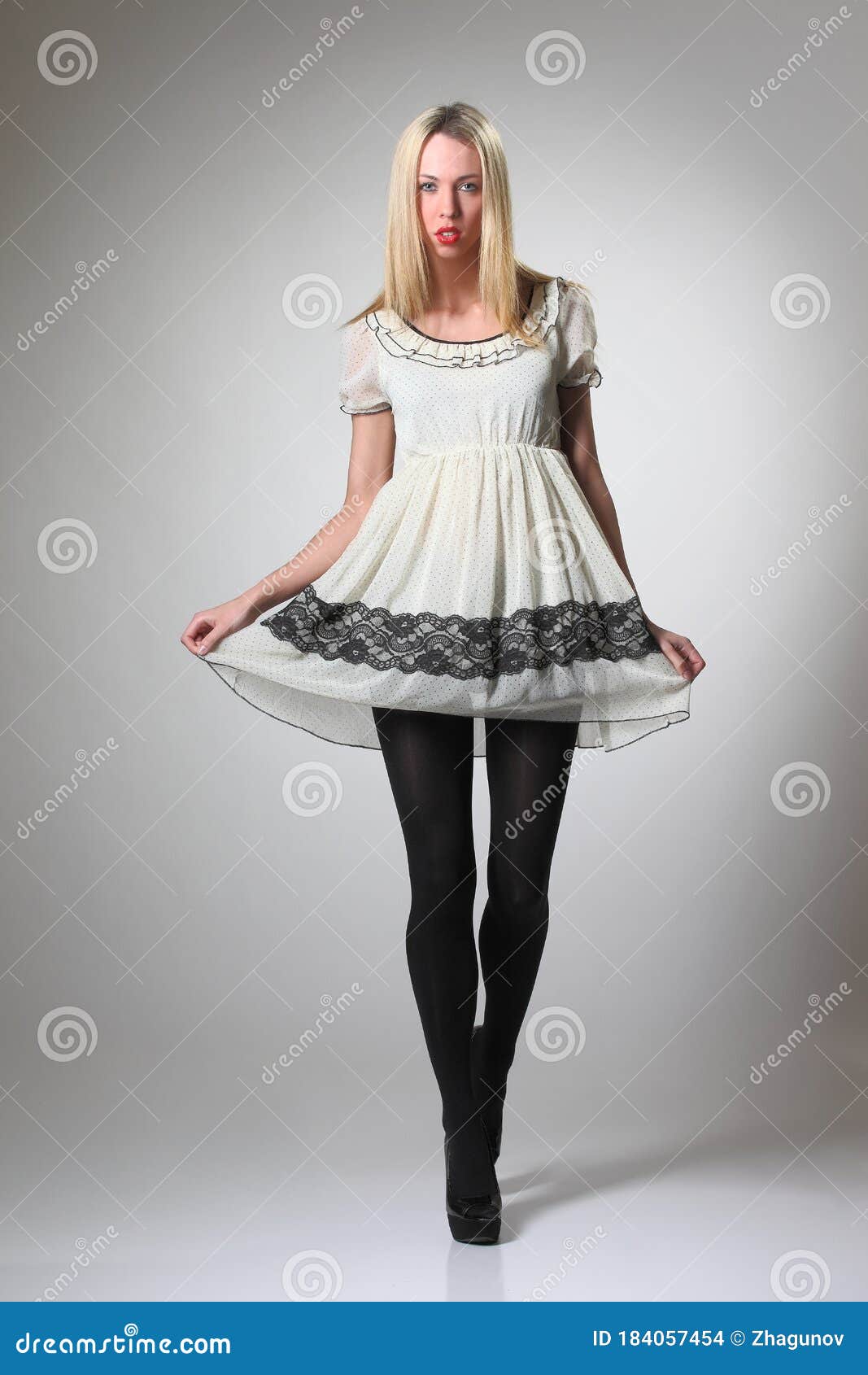 Fashion Model in Dress Posing in Studio Stock Photo - Image of ...