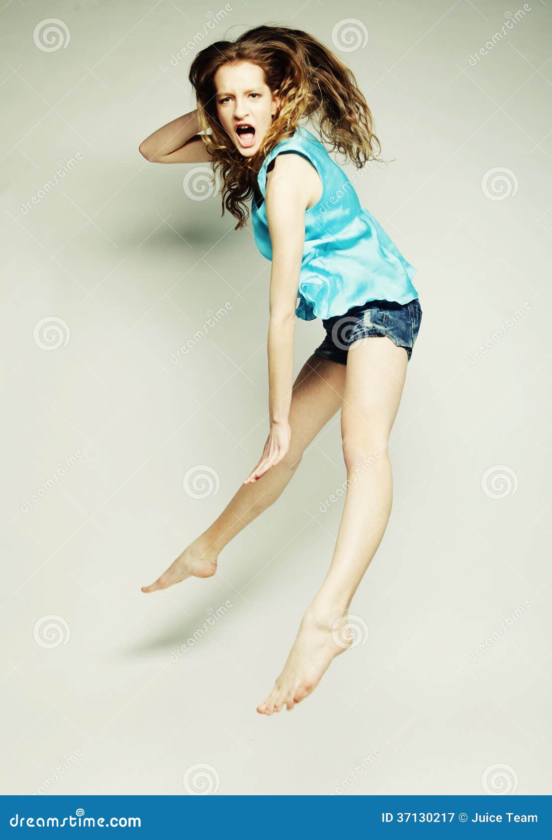 Fashion Model Jumps in Studio Stock Image - Image of glamor, jumping ...