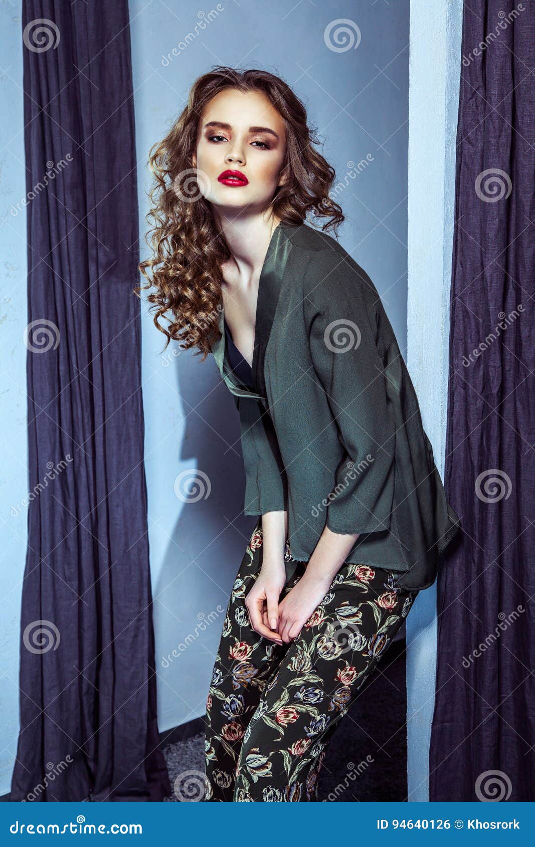 Fashion Model with Makeup and Wavy Hairstyle is Posing in Fitting Room ...