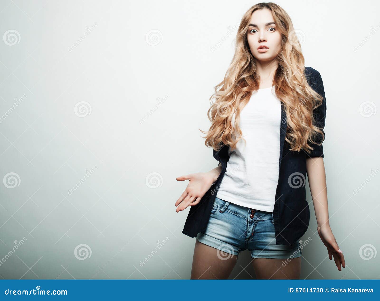 Fashion Model Posing in Studio, White Background Stock Photo - Image of ...