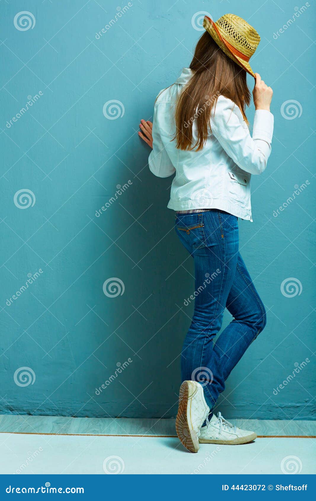 Fashion Model Standing Back Stock Photo - Image of face, jeans: 44423072