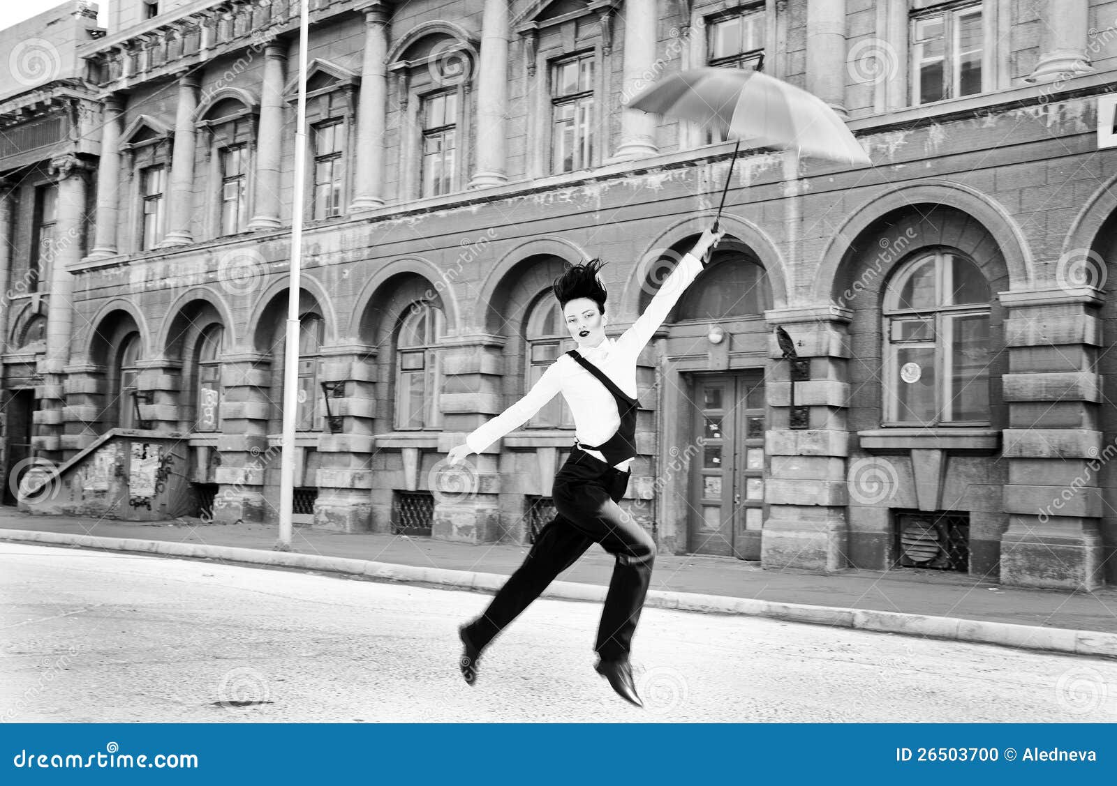 Fashion Model in a Suit in a Jump Stock Photo - Image of arms ...