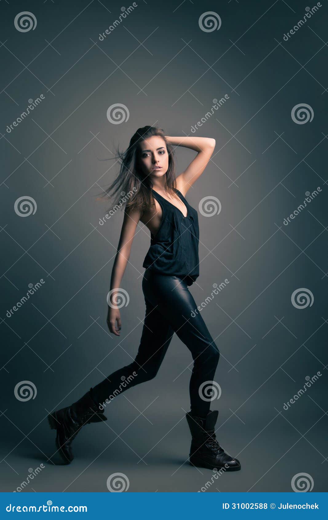 Fashion Model Wearing Leather Pants Posing on Grey Stock Photo - Image ...