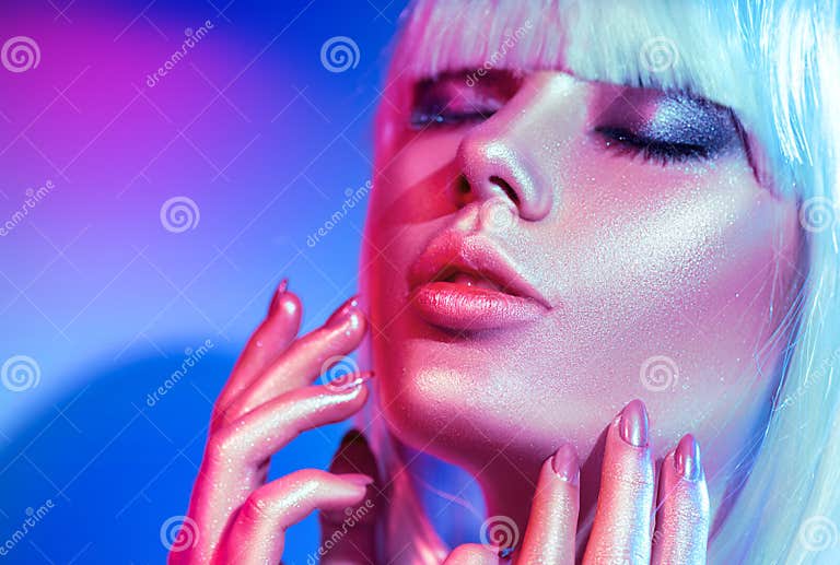 Fashion Model Woman In Colorful Bright Sparkles And Neon Lights Posing