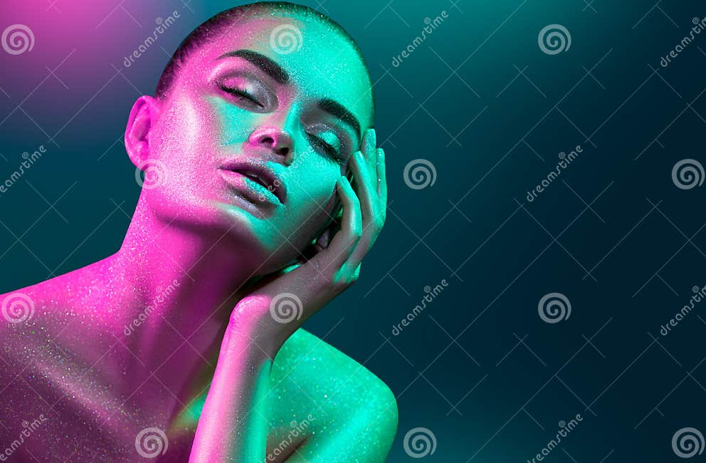 Fashion Model Woman In Colorful Bright Sparkles And Neon Lights Posing