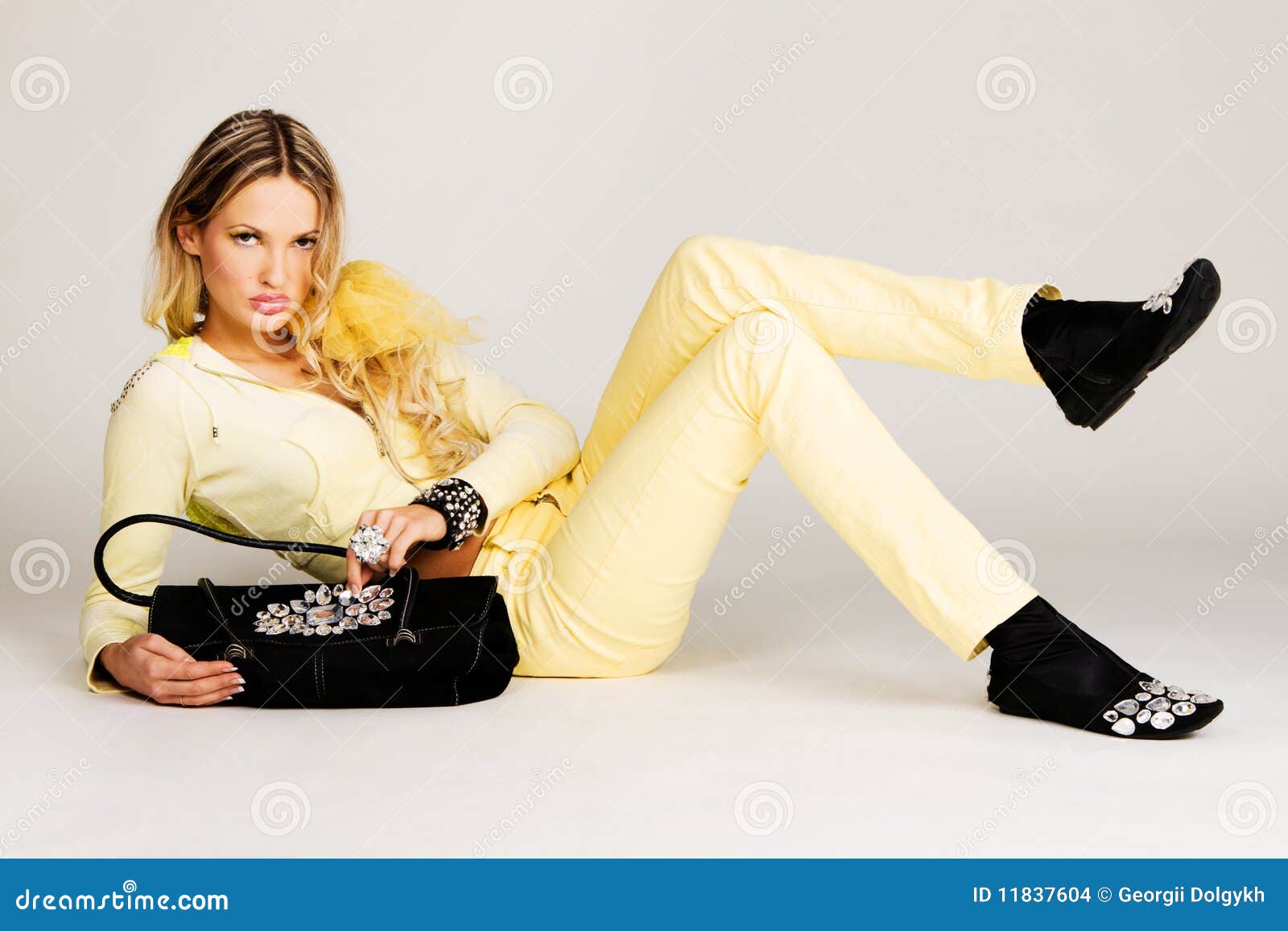 Fashion model in yellow stock photo. Image of female - 11837604