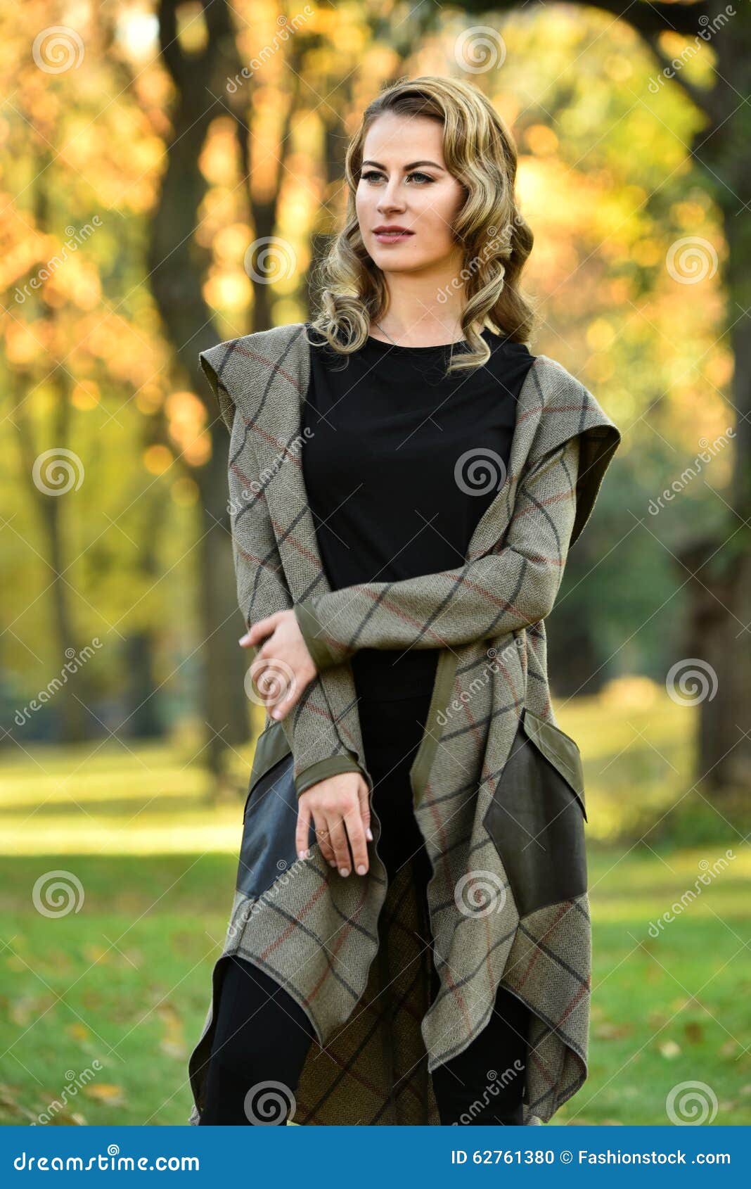 Fashion Photo Of Beautiful Woman Posing In Elegant Coat Outdoors Stock